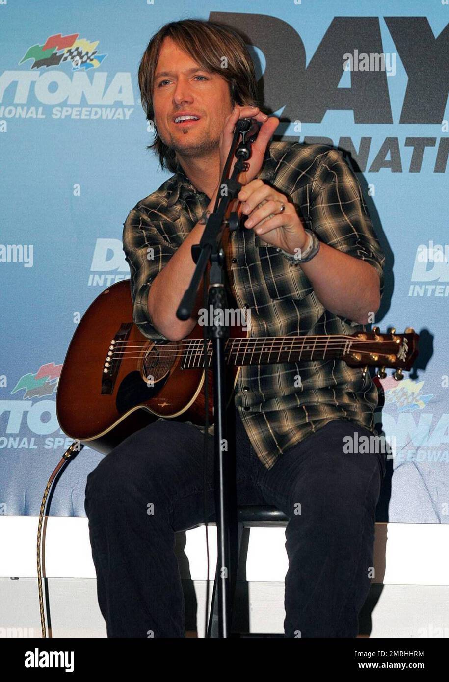 Country singer Keith Urban performs in the media center at Daytona ...