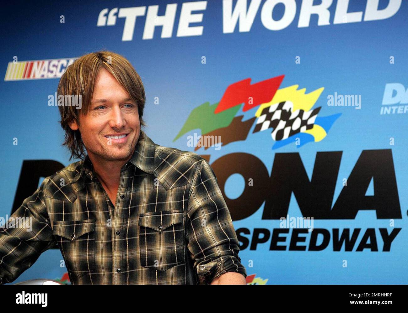 Country singer Keith Urban performs in the media center at Daytona ...
