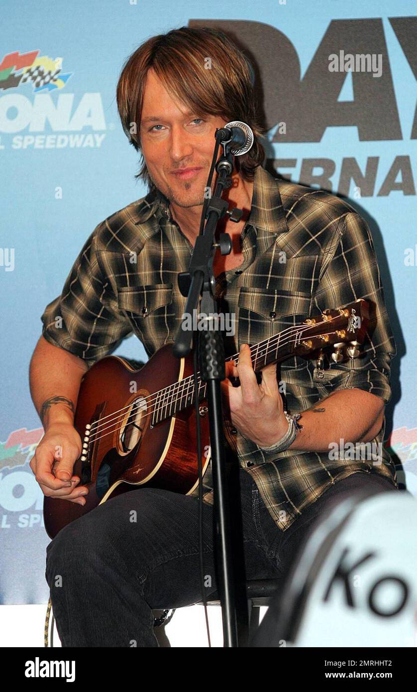 Country singer Keith Urban performs in the media center at Daytona ...