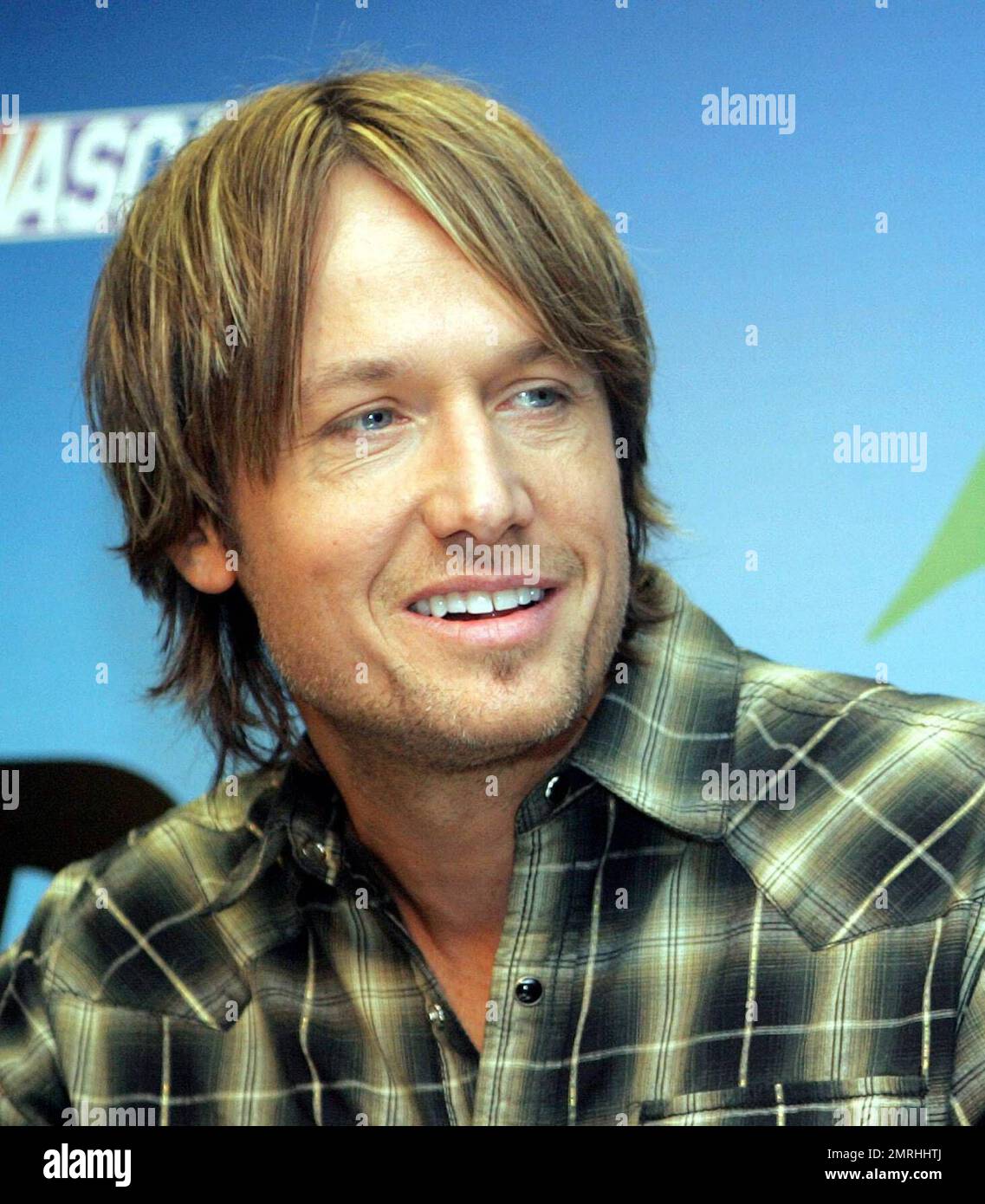 Country singer Keith Urban performs in the media center at Daytona ...