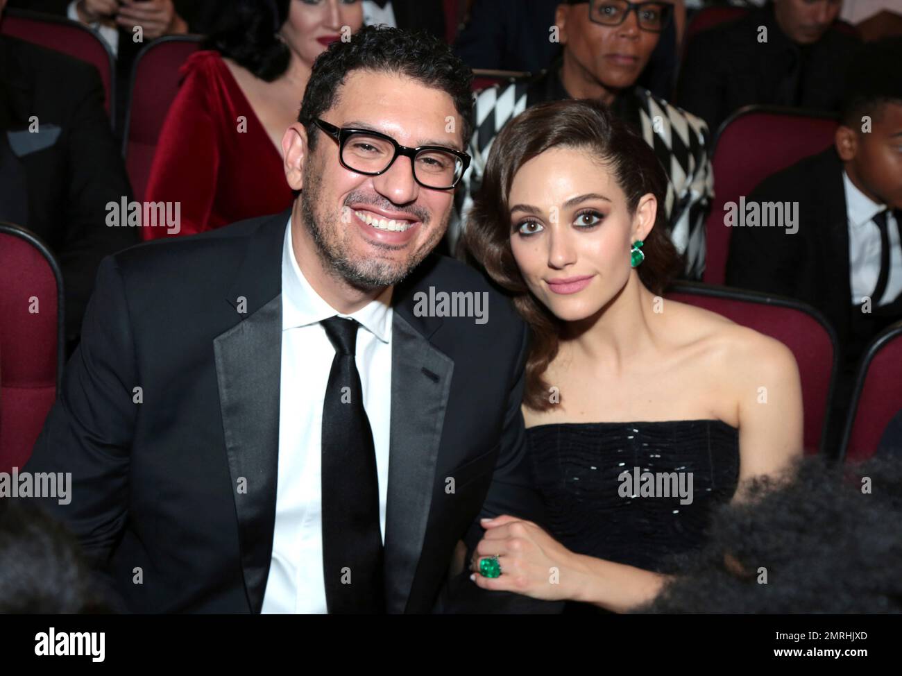Sam Esmail, left, and Emmy Rossum pose in the audience at the 69th ...