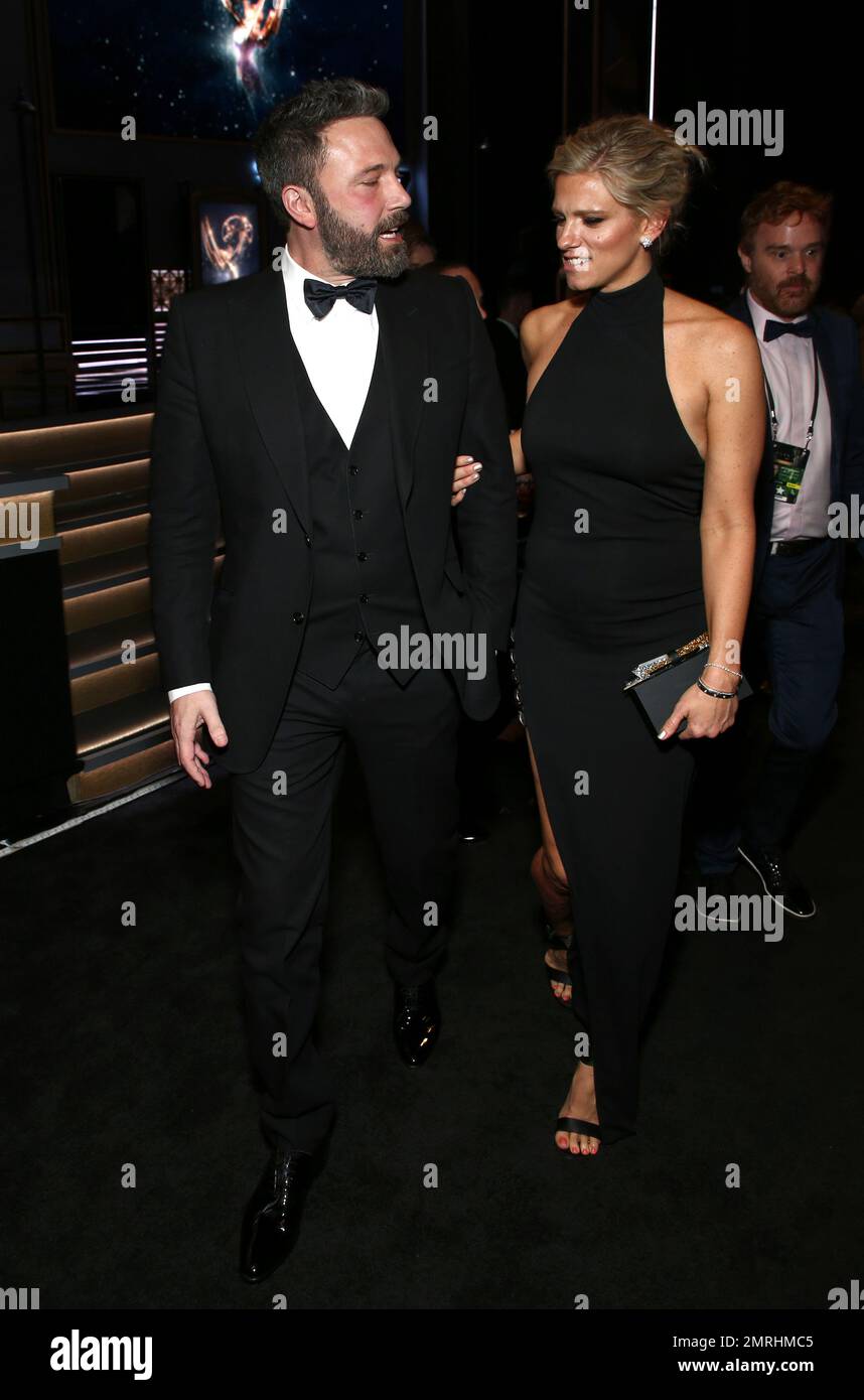 Ben Affleck, left, and Lindsay Shookus pose in the audience at the 69th ...