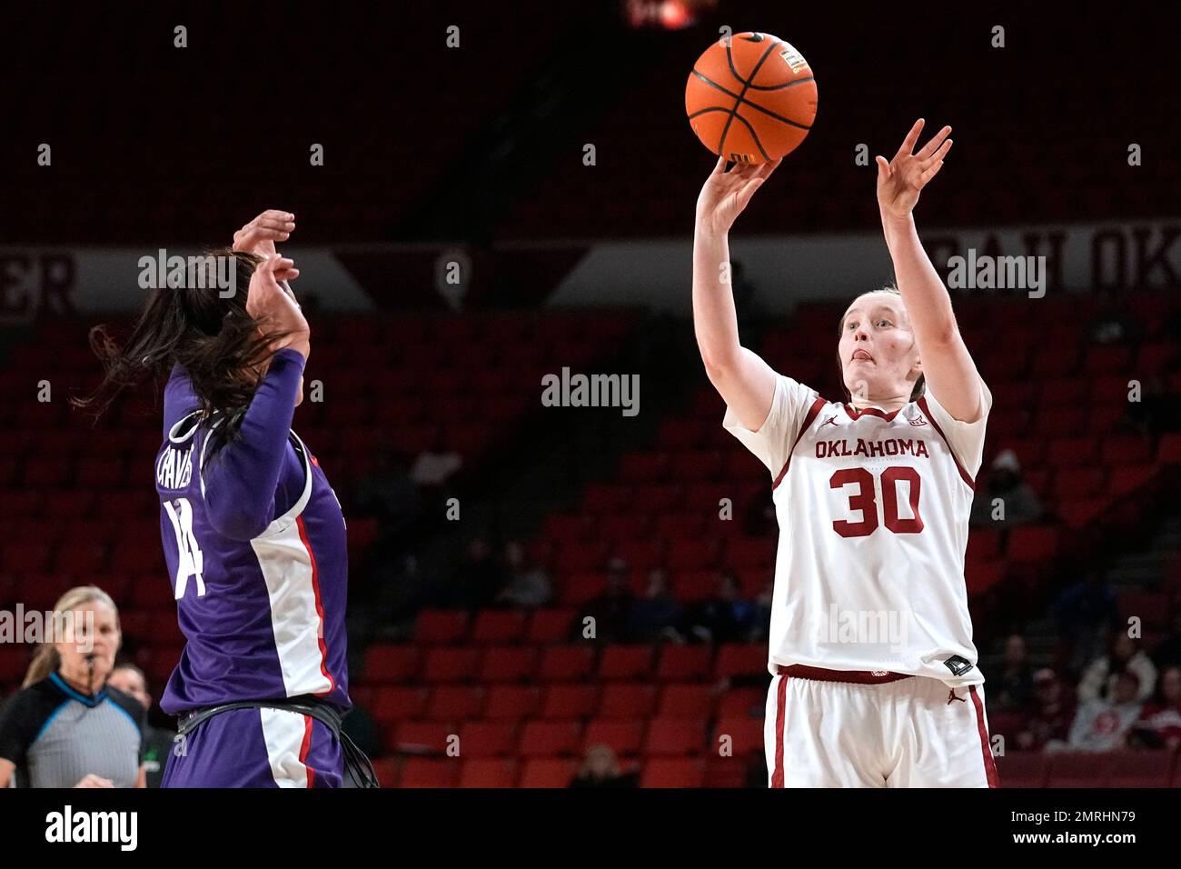 Oklahoma guard Taylor Robertson (30) shoots a three-point basket in ...