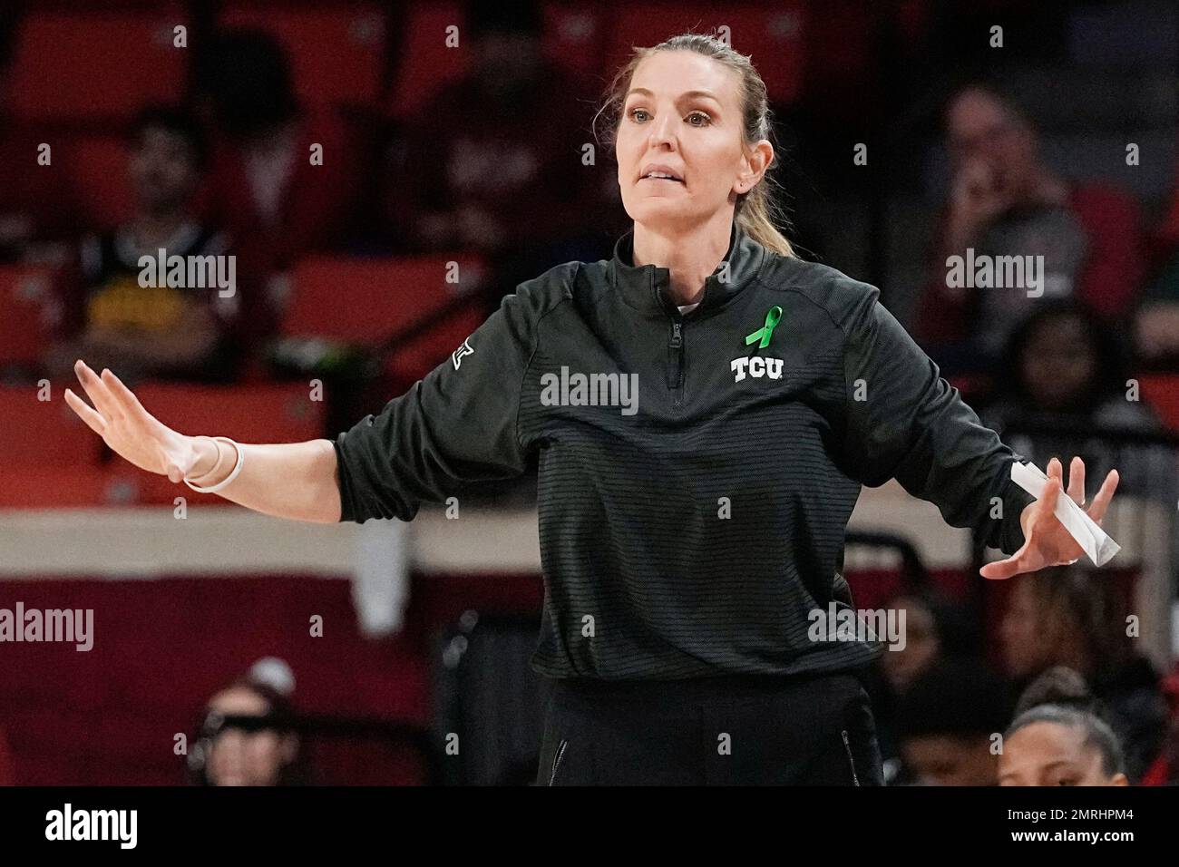 TCU head coach Raegan Pebley gestures in the second half of an NCAA ...