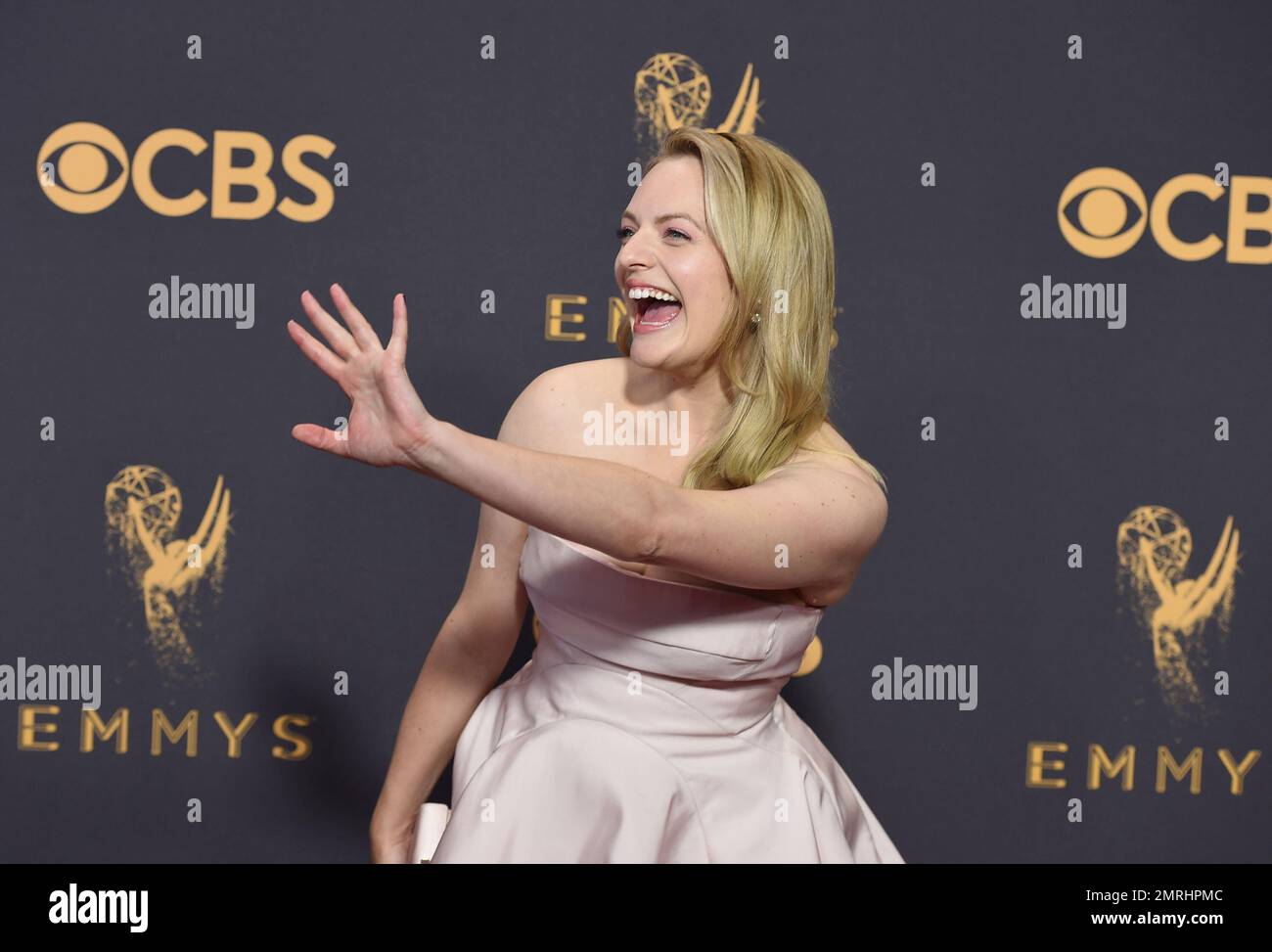 Elisabeth Moss arrives at the 69th Primetime Emmy Awards on Sunday ...