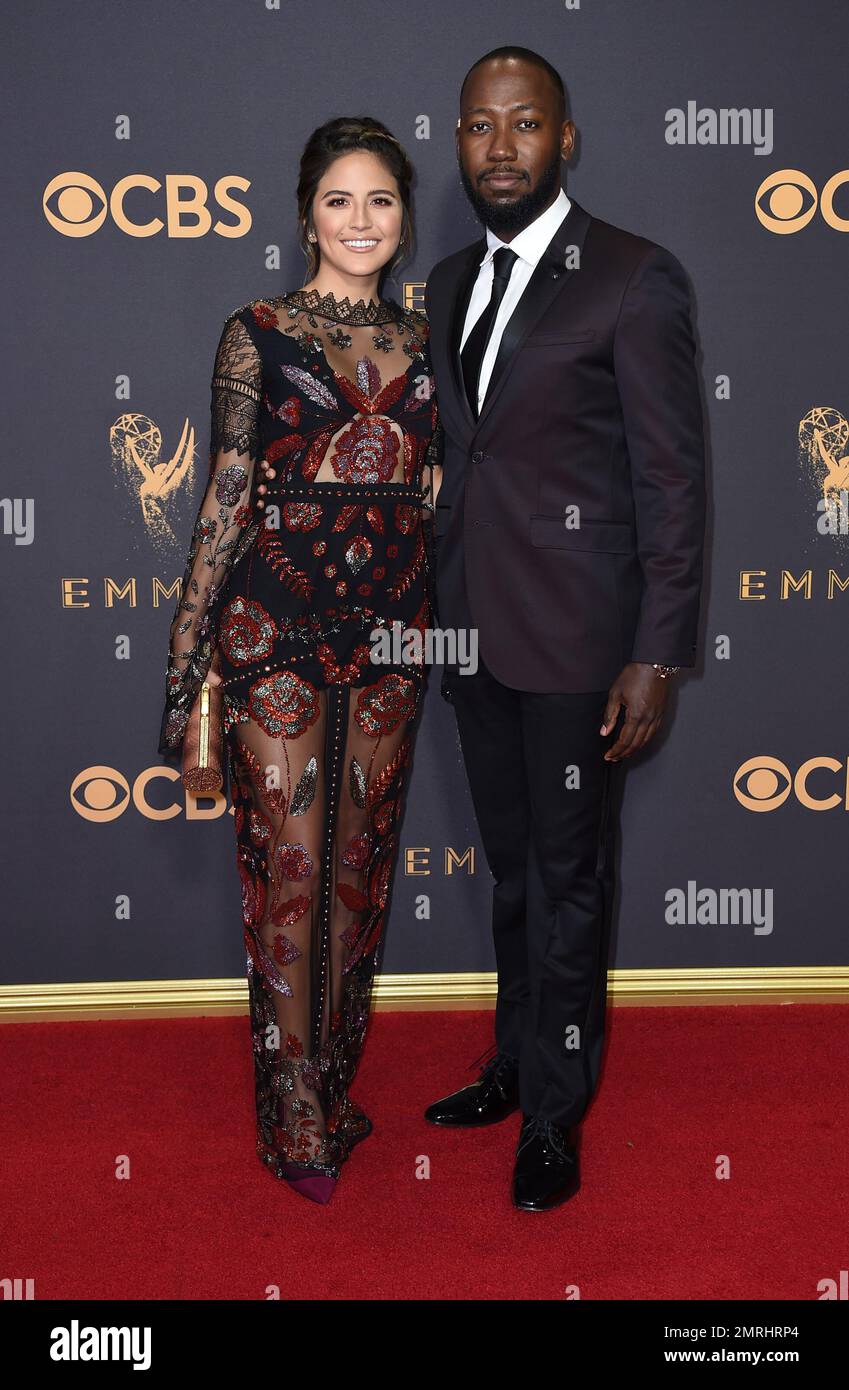 Erin Lim, left, and Lamorne Morris arrive at the 69th Primetime Emmy Awards on Sunday, Sept. 17 ...