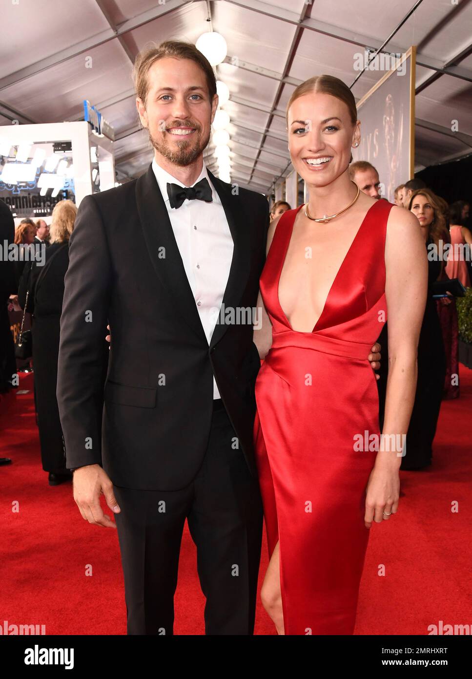 Tim Loden, left, and Yvonne Strahovski arrive at the 69th Primetime ...