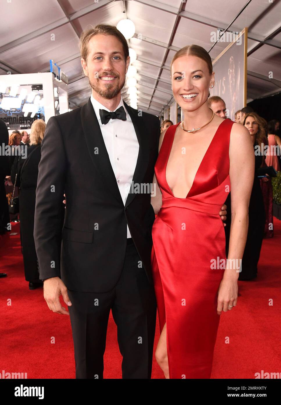 Tim Loden, left, and Yvonne Strahovski arrive at the 69th Primetime ...