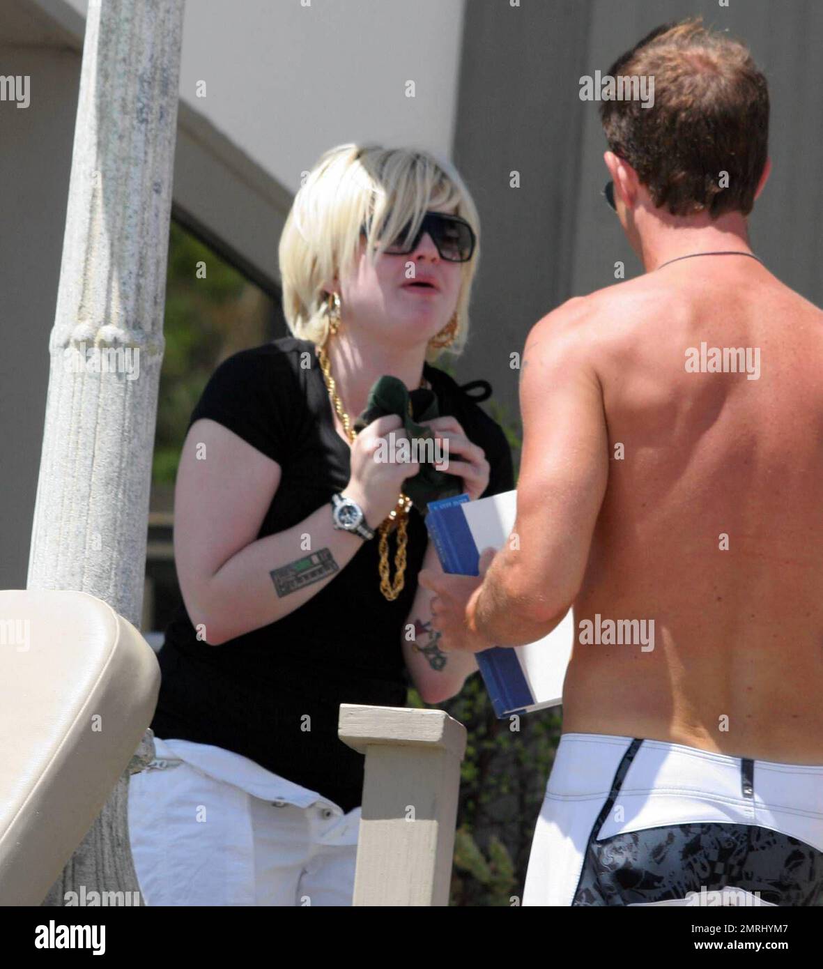 Kelly Osbourne snuggles with her new boyfriend at a beach house in ...