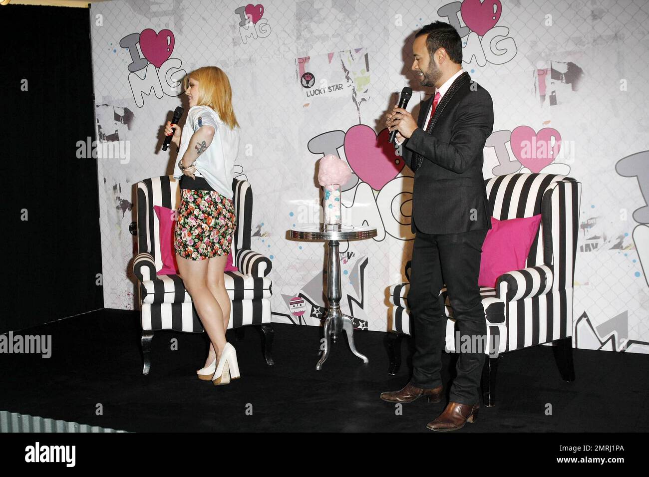 Decked out in some 'Material Girl' clothes including a light blue denim ...