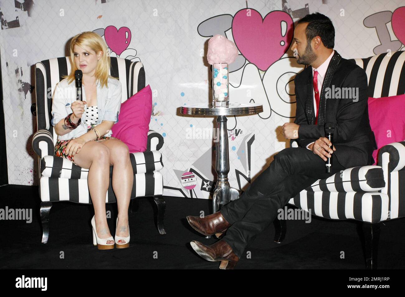 Decked out in some 'Material Girl' clothes including a light blue denim ...