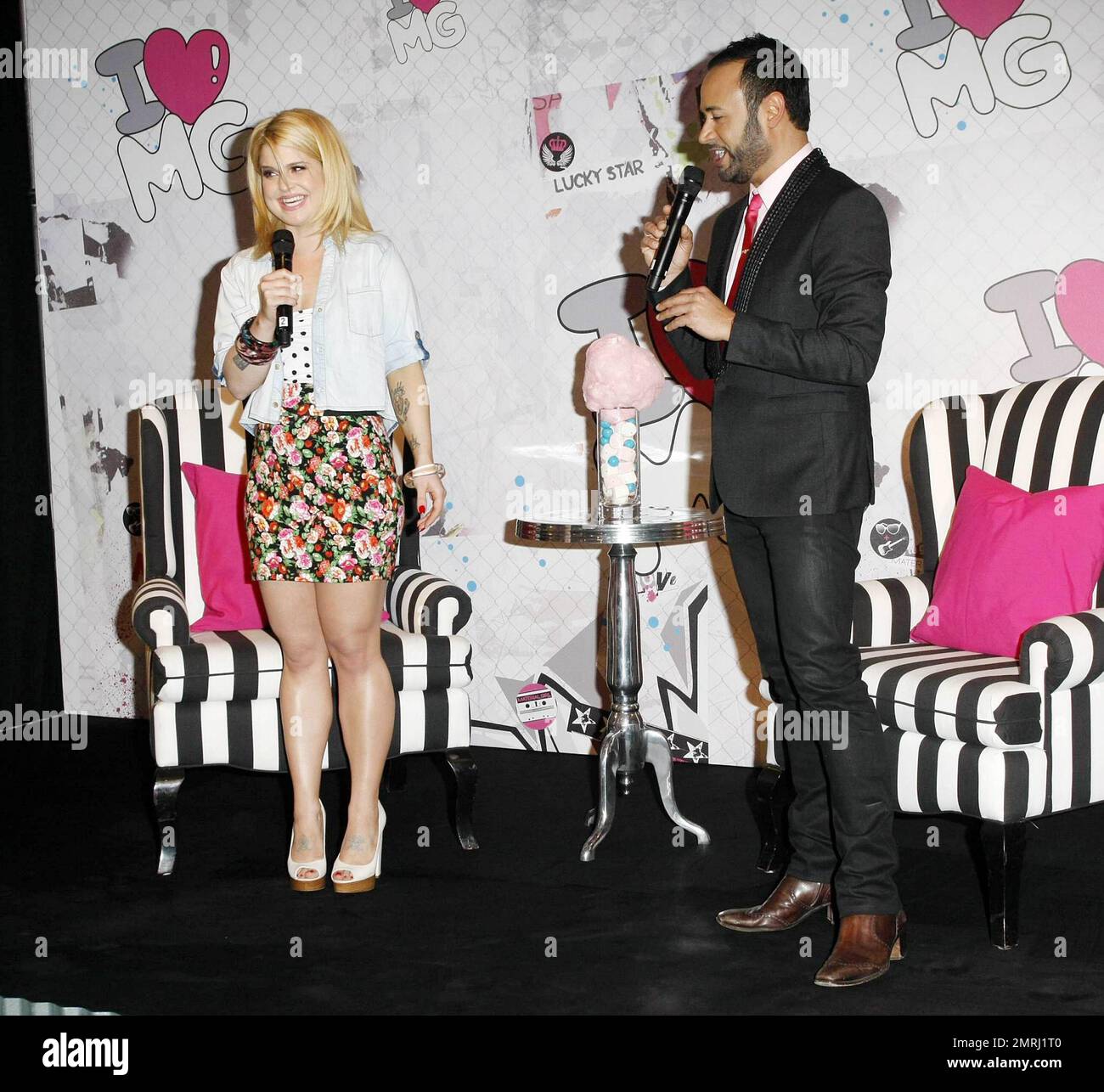 Decked out in some 'Material Girl' clothes including a light blue denim ...