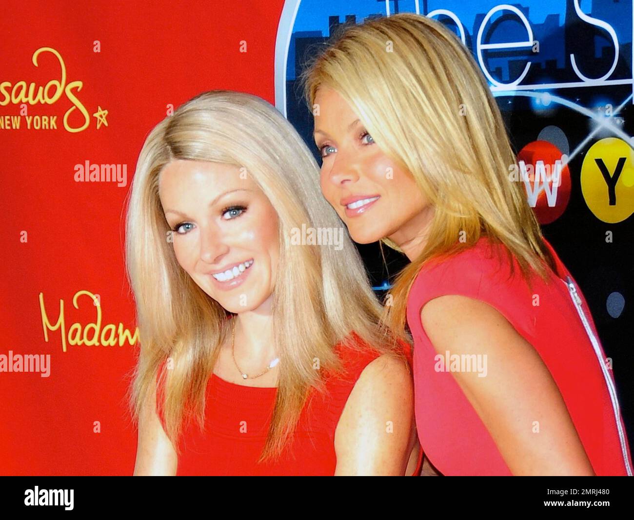 Kelly Ripa is joined by husband Mark Consuelos as she unveils her ...