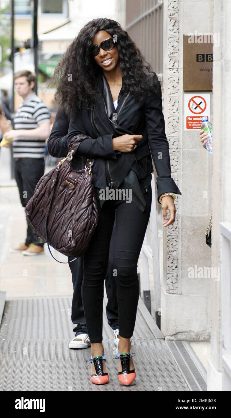 Singer Kelly Rowland leaves BBC Radio 1 clutching her oversized Miu Miu ...