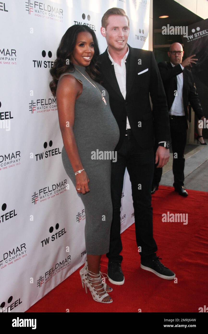 Pregnant Kelly Rowland attends the Debut of the new signature Kelly ...