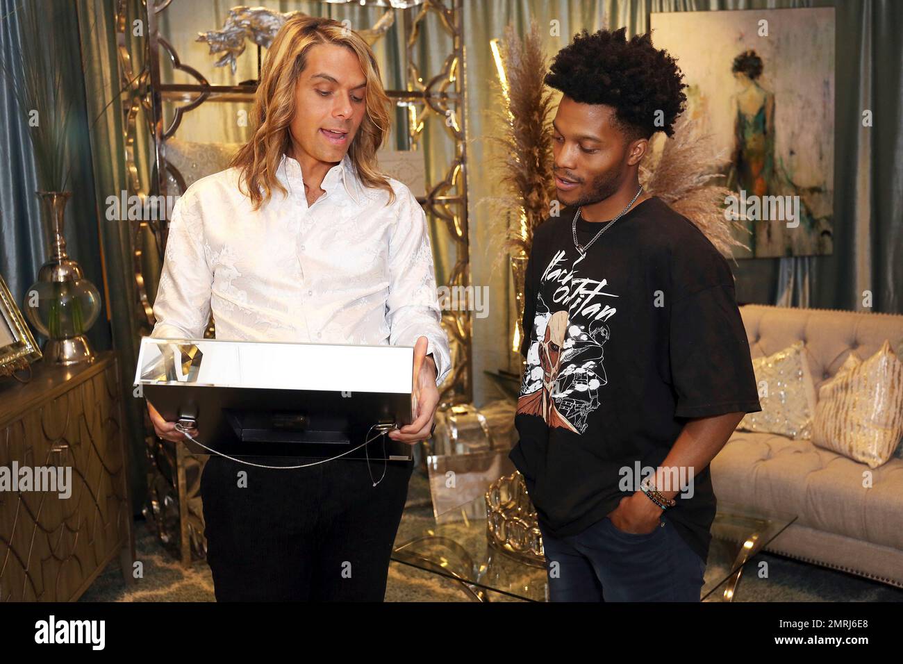 Designer Sparkle Josh, left, and actor Jermaine Fowler seen at the ...