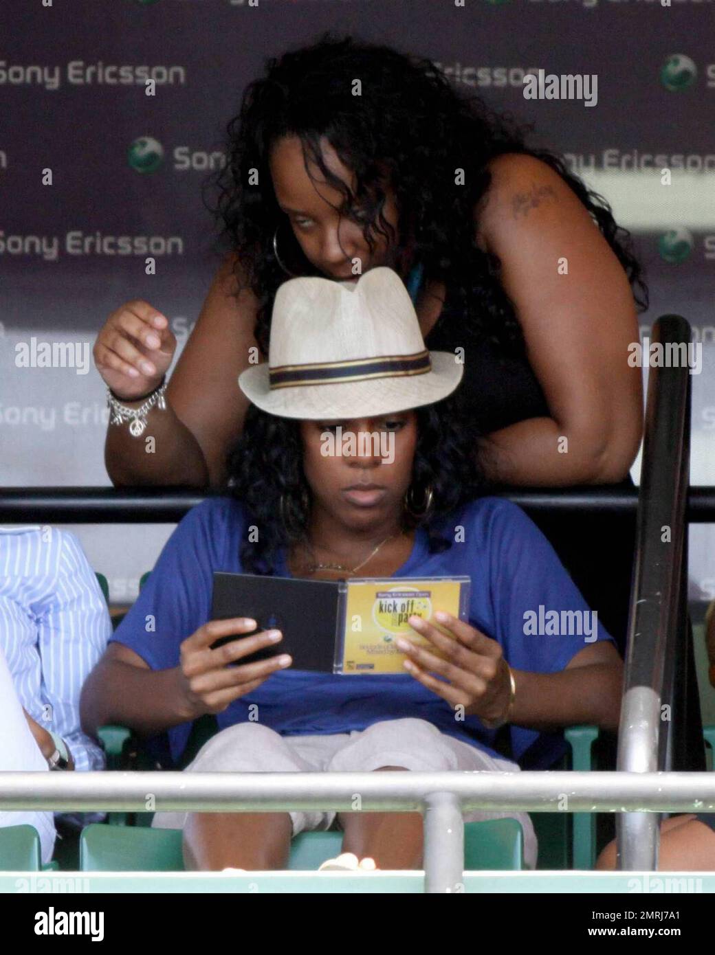 Singer and songwriter Kelly Rowland watches her friend Serena Williams ...