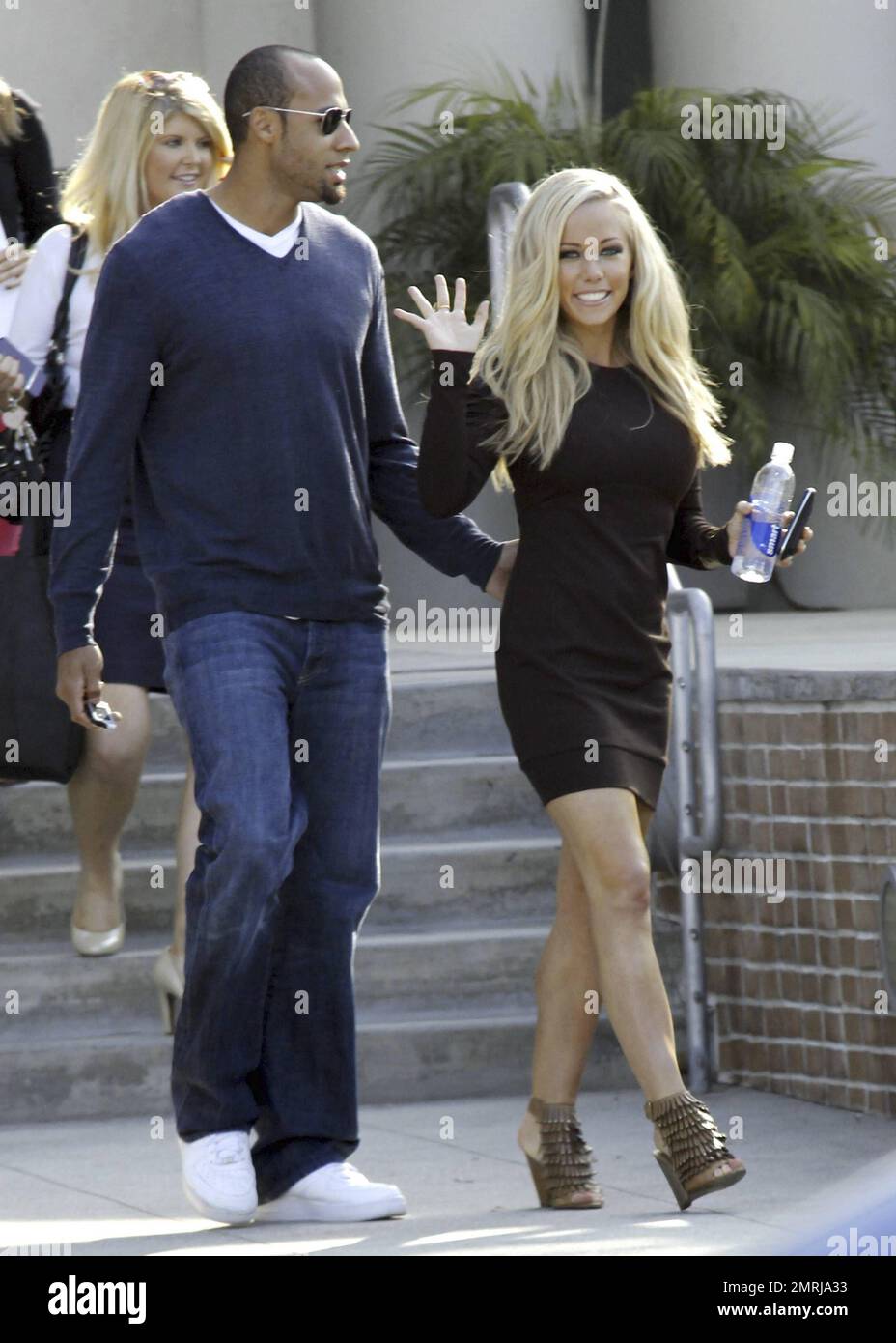 Kendra Wilkinson and Hank Baskett look very much the happy couple as ...