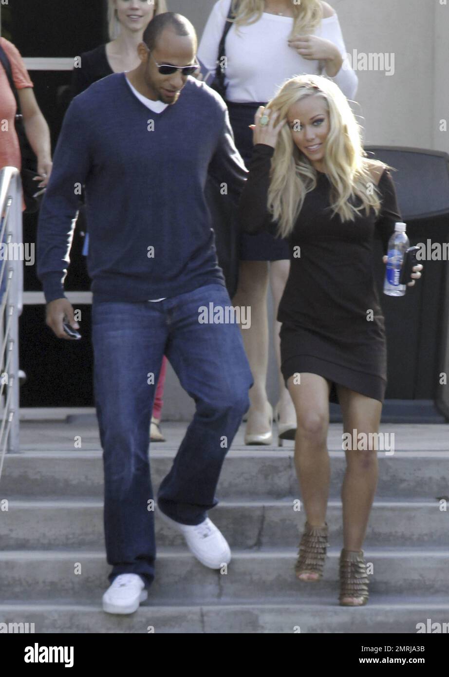 Kendra Wilkinson and Hank Baskett look very much the happy couple as ...