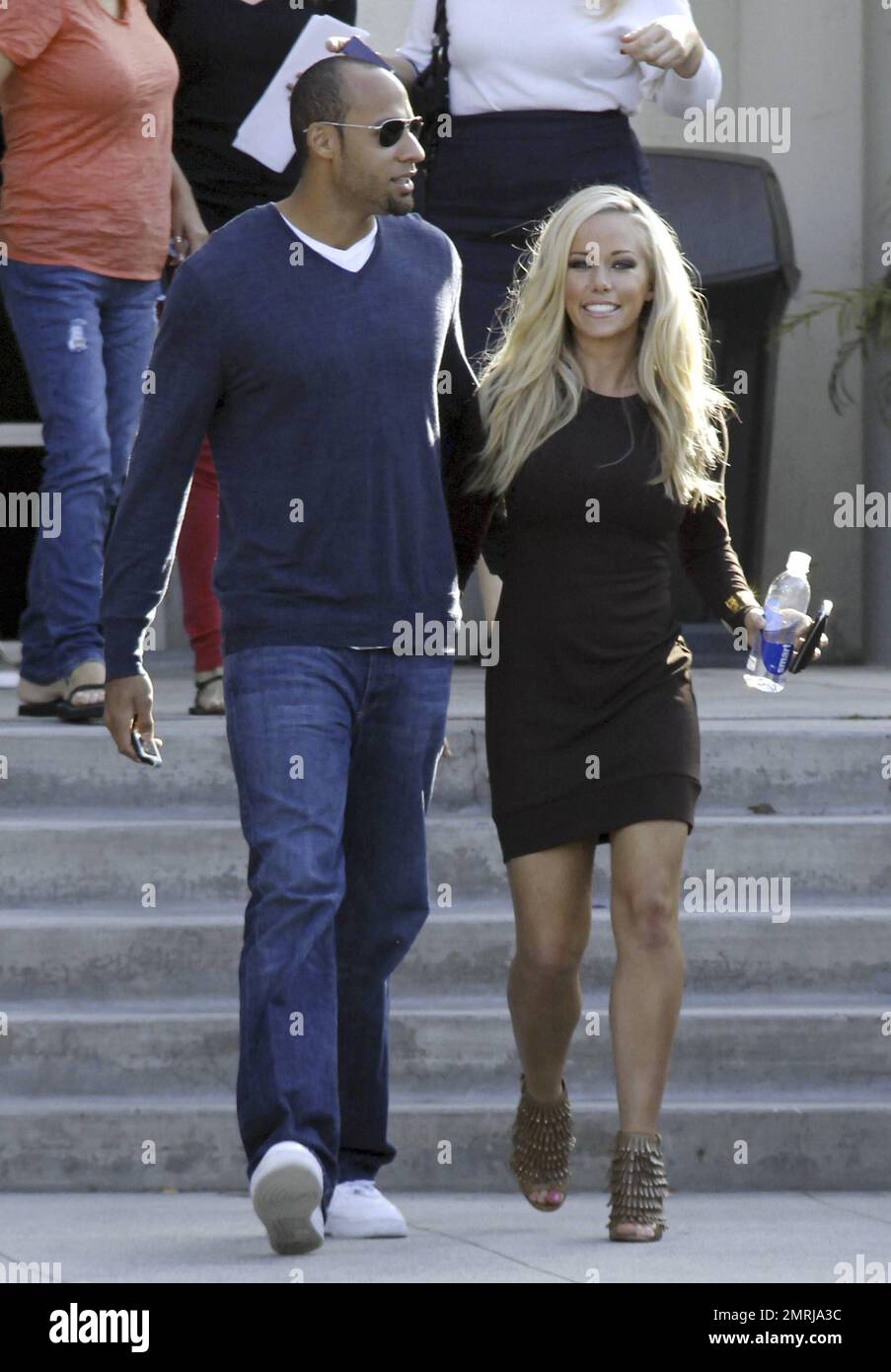 Kendra Wilkinson and Hank Baskett look very much the happy couple as ...