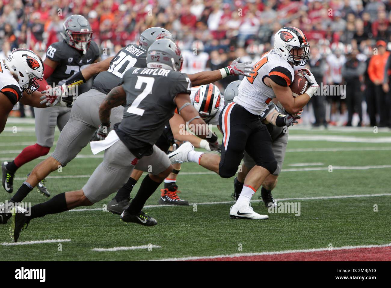Oregon State running back Ryan Nall (34), right, runs for a touchdown ...