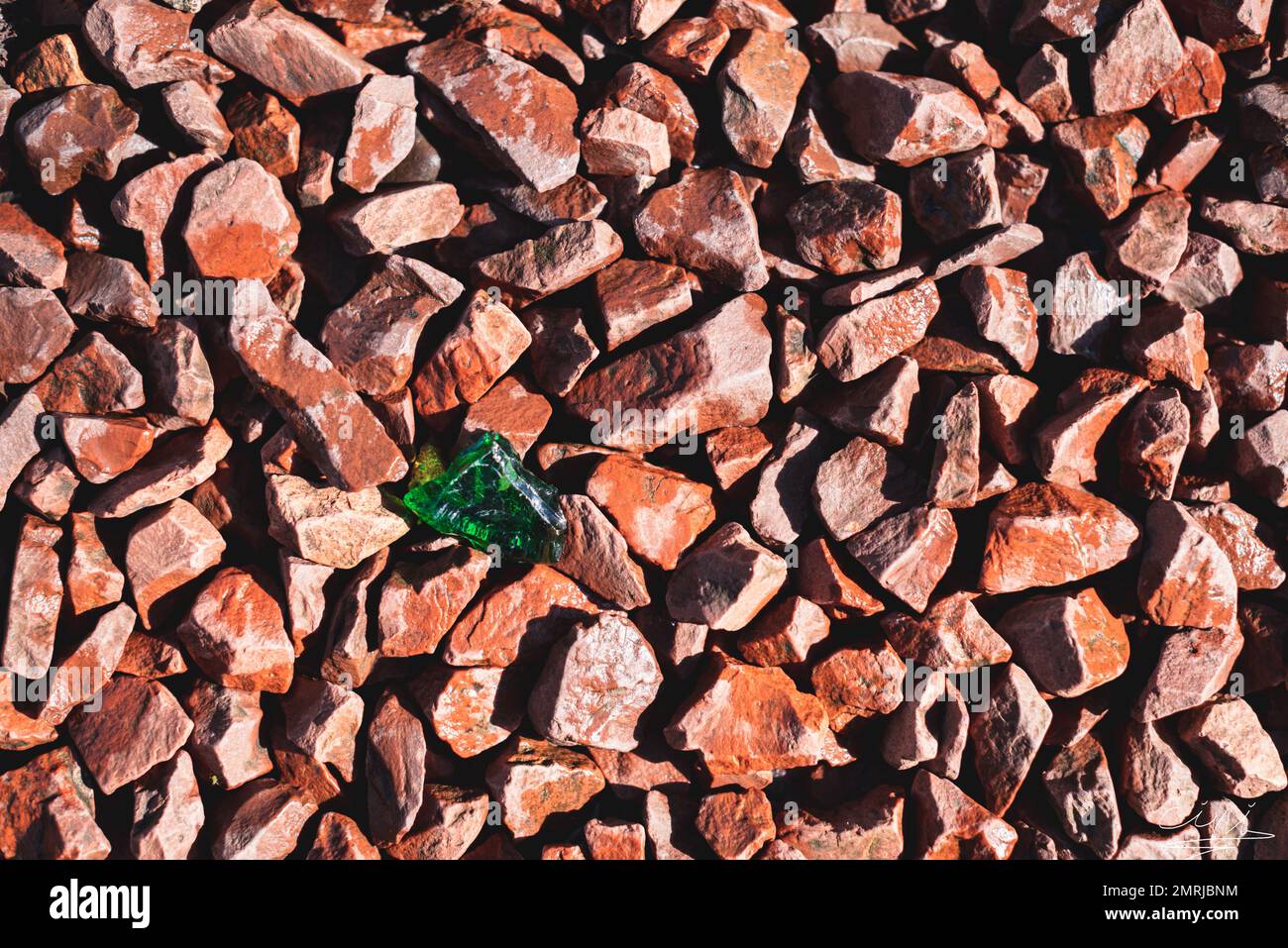 A top view of a heap of granite small stones with sunlight Stock Photo ...