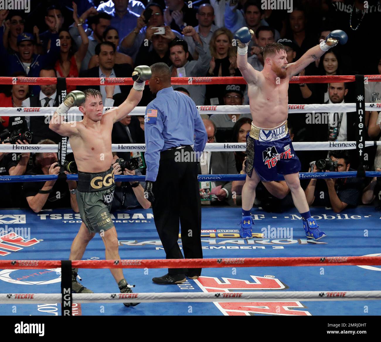 Canelo Alvarez, right, and Gennady Golovkin celebrate following a ...