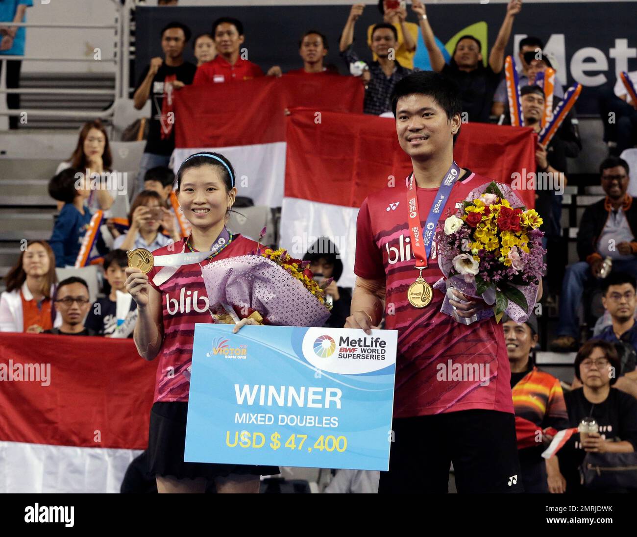 Indonesia's Debby Susanto, left, and her teammate Praveen Jordan show ...