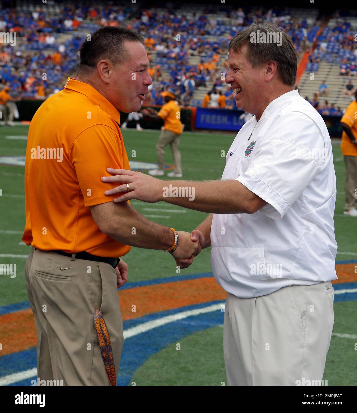 Tennessee head coach Butch Jones, left, and Florida head coach Jim ...
