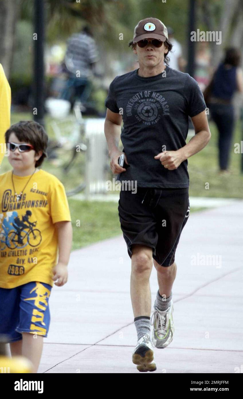 Actor Kevin Bacon gets in some jogging along the beach in Miami's ...