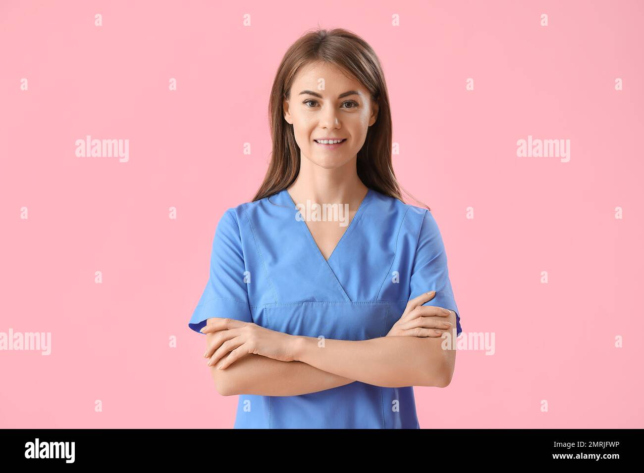 Female medical intern on pink background Stock Photo - Alamy