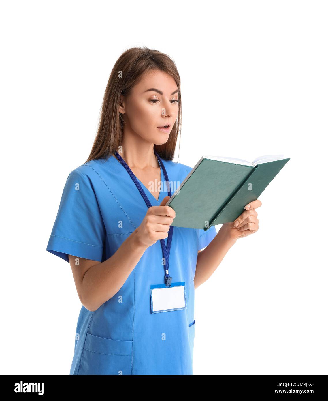 Female medical assistant reading book on white background Stock Photo ...