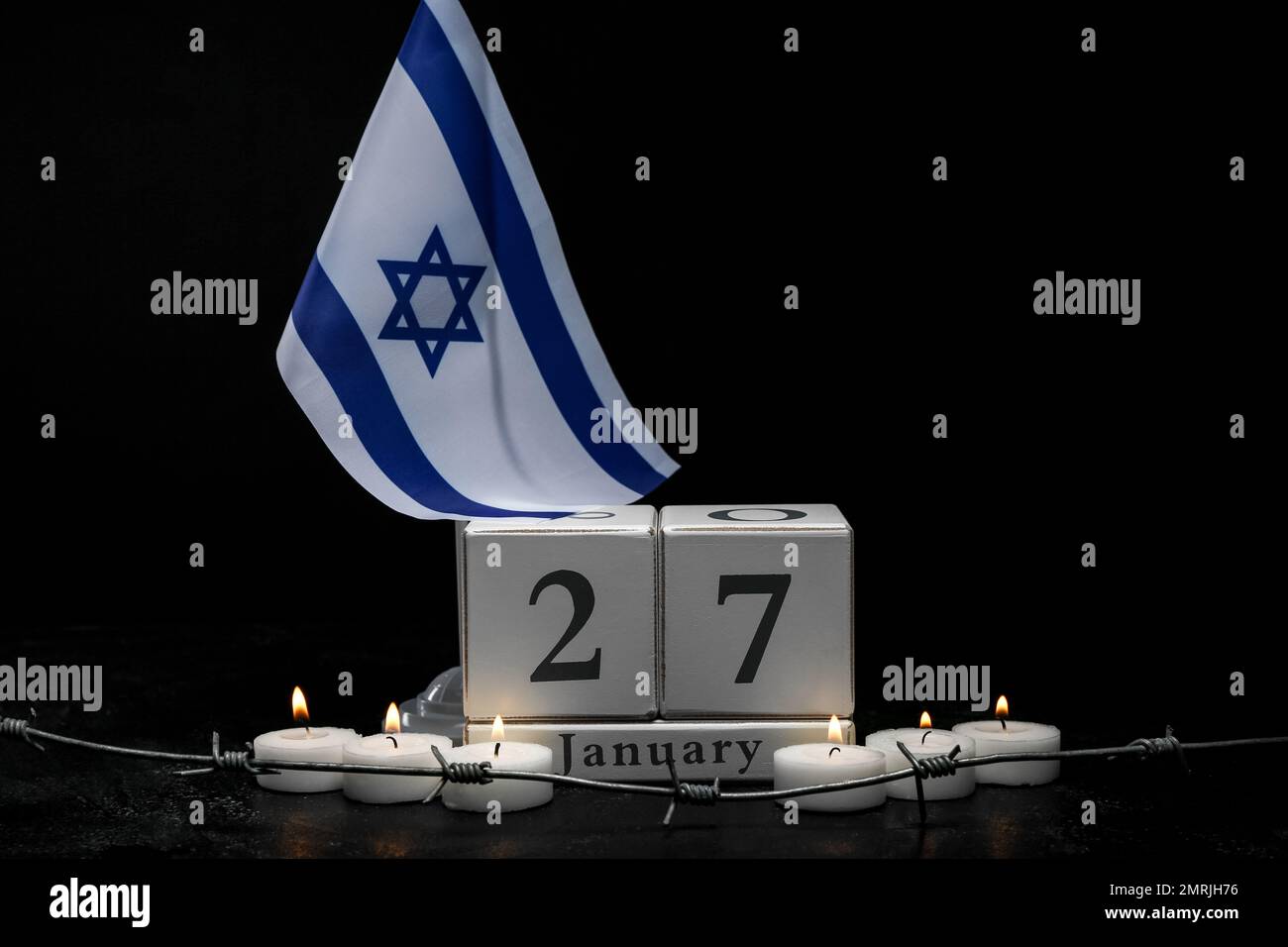 Calendar with date 27 JANUARY, flag of Israel, burning candles and ...