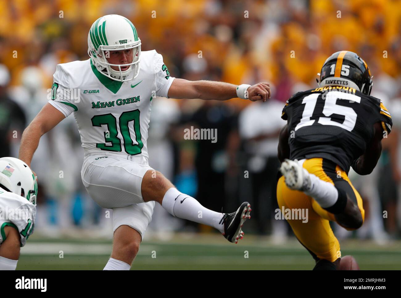 Iowa defensive back Joshua Jackson (15) blocks a field goal by North ...