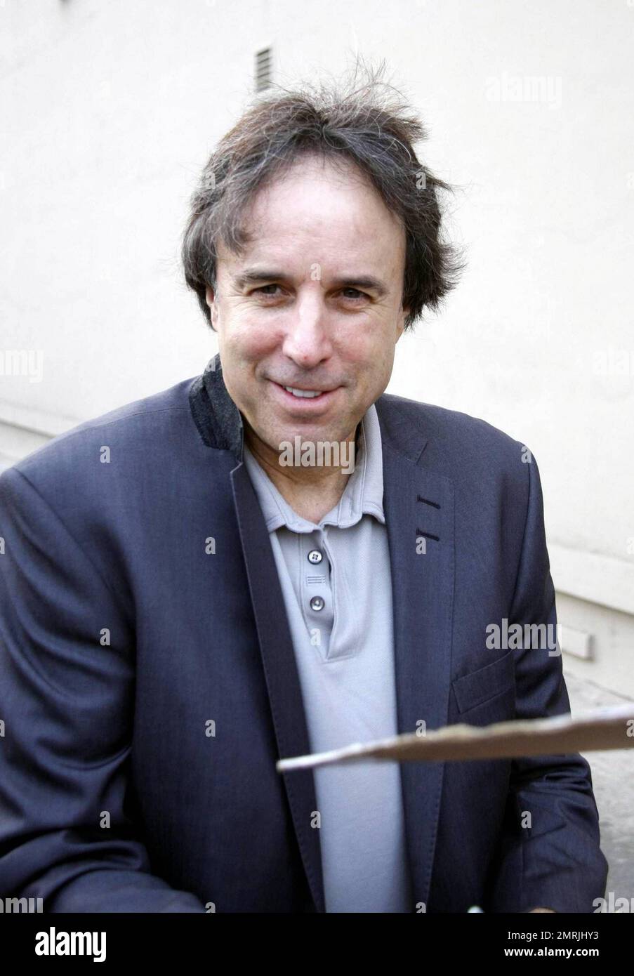 Actor and comedian Kevin Nealon signs autographs for fans as he leaves ...