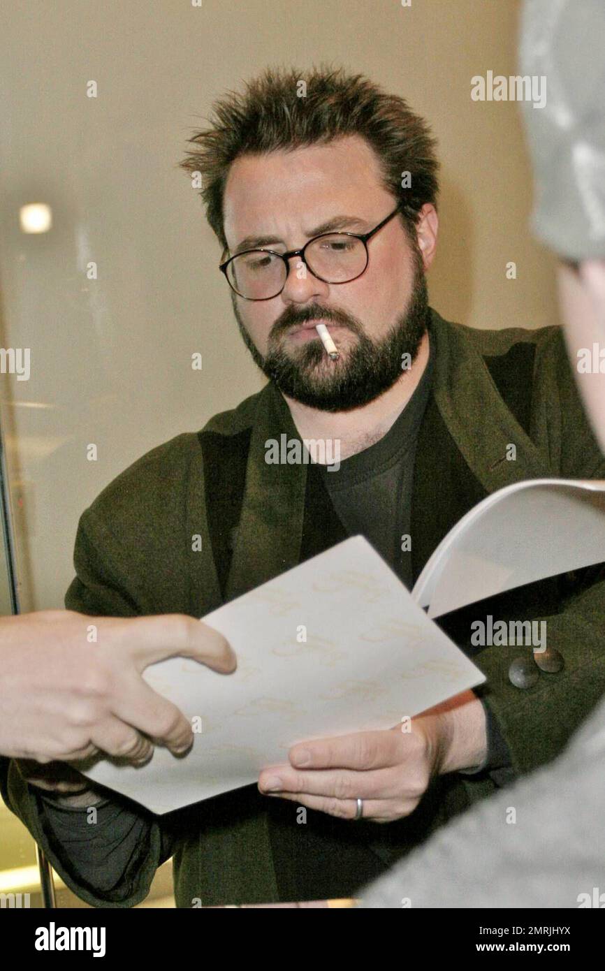 Film Director and screenwriter Kevin Smith signs autographs outside the ...