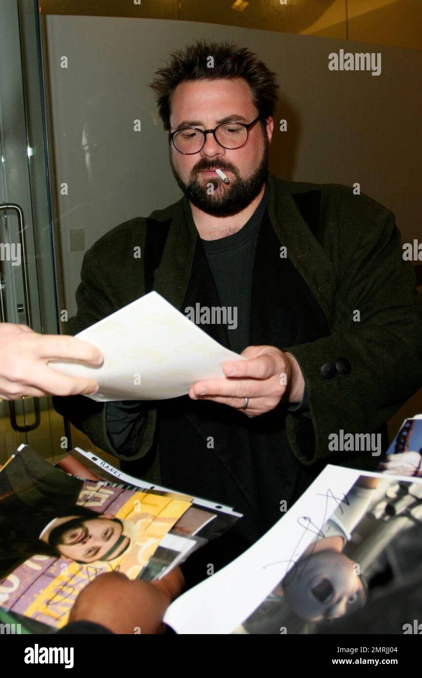 Film Director and screenwriter Kevin Smith signs autographs outside the ...