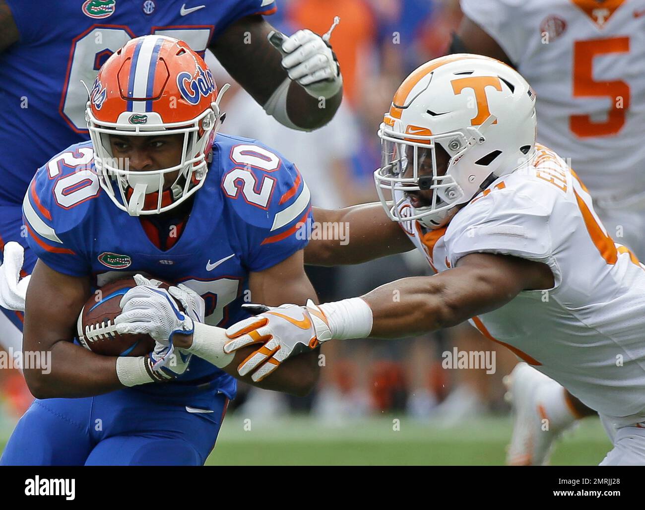 Florida running back Malik Davis (20) tries to get past Tennessee ...