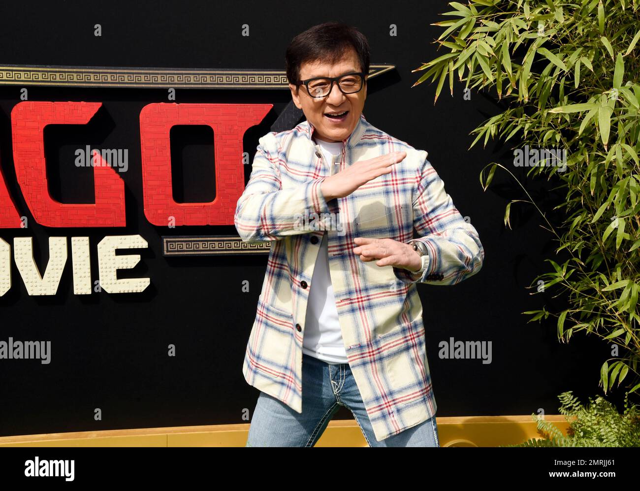 Jackie Chan, a cast member in "The LEGO Ninjago Movie," poses at the ...