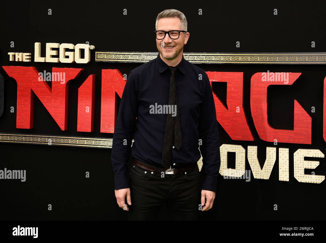 Charlie Bean, director of "The LEGO Ninjago Movie," poses at the ...