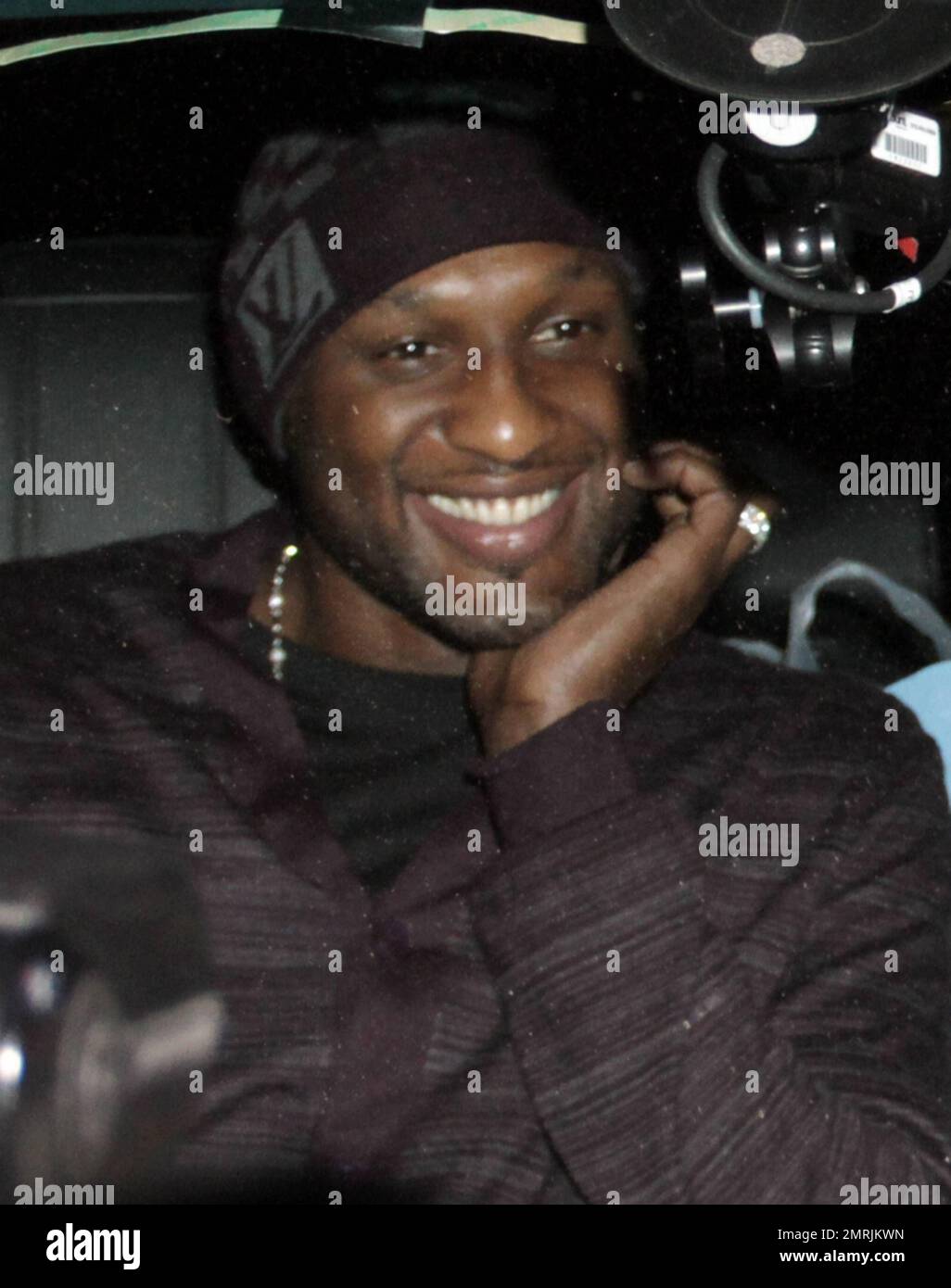 Khloe Kardashian with her husband Lamar Odom and her brother Rob ...