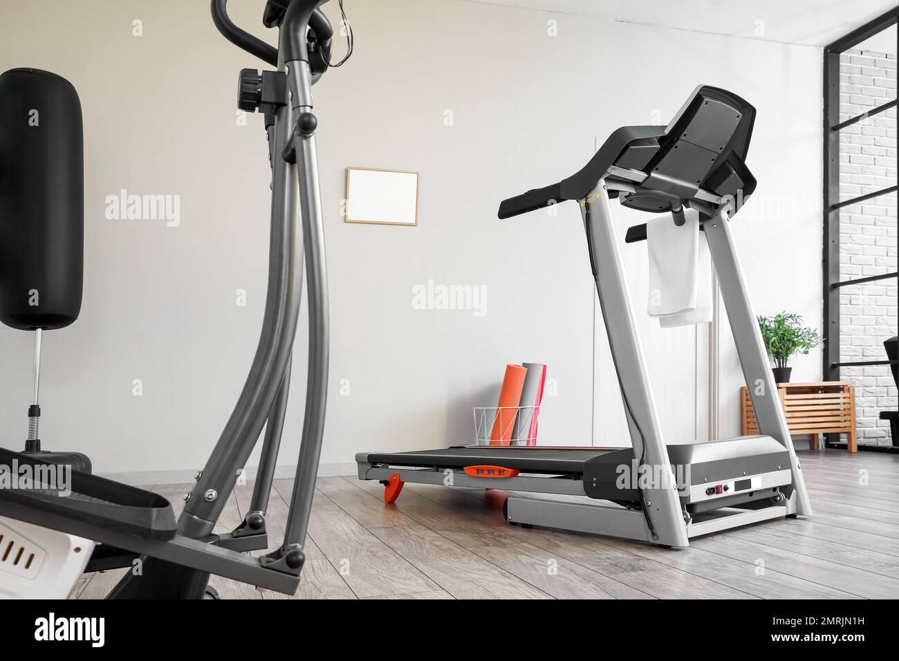 Interior of gym with modern treadmill and sport equipment Stock Photo ...