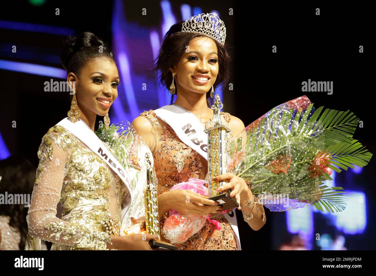 Most Beautiful Girl in Nigeria winner Ihezue Ugochi Mitchel, right, and ...