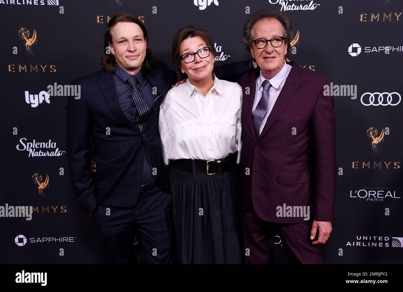 Actor Geoffrey Rush, right, poses with his wife Jane Menelaus and their ...