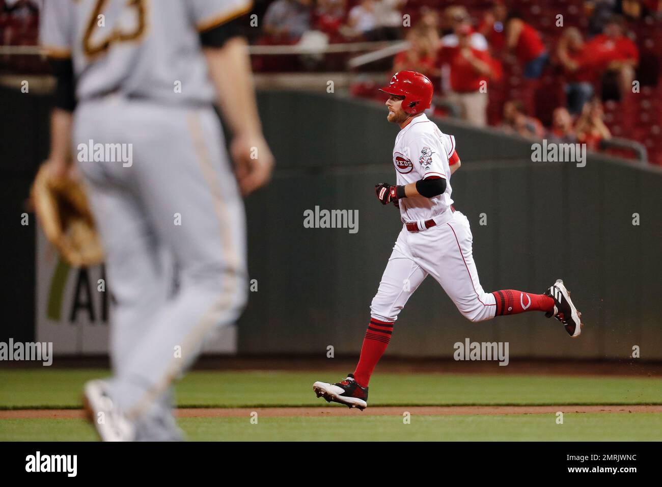 Cincinnati Reds' Zack Cozart runs the bases after hitting a solo home ...