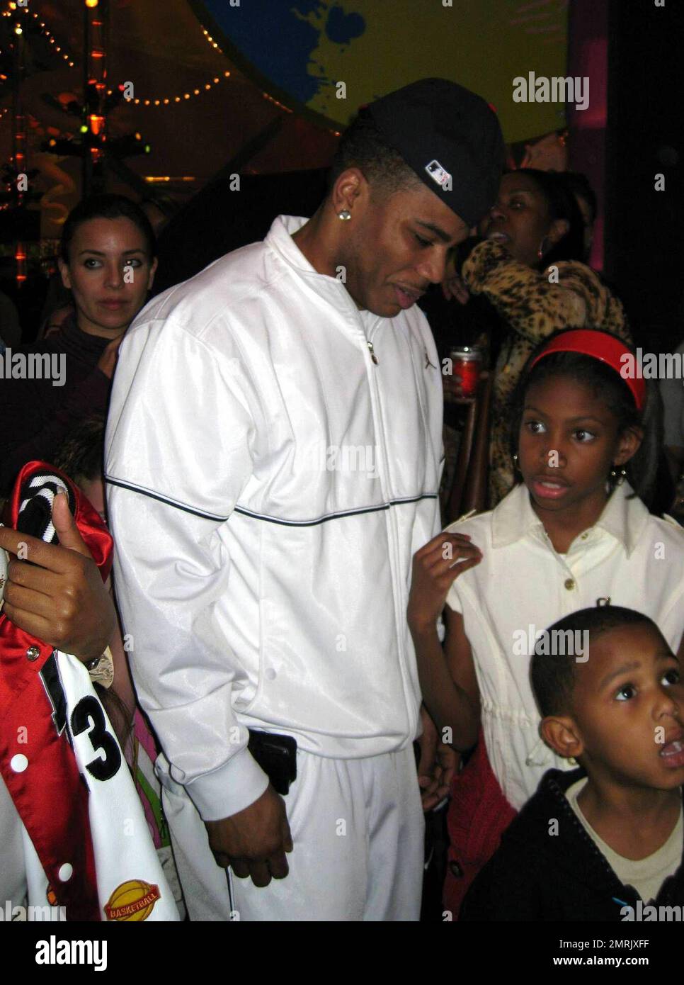 Rapper Nelly signs autographs for young fans at the Kids Choice Awards ...