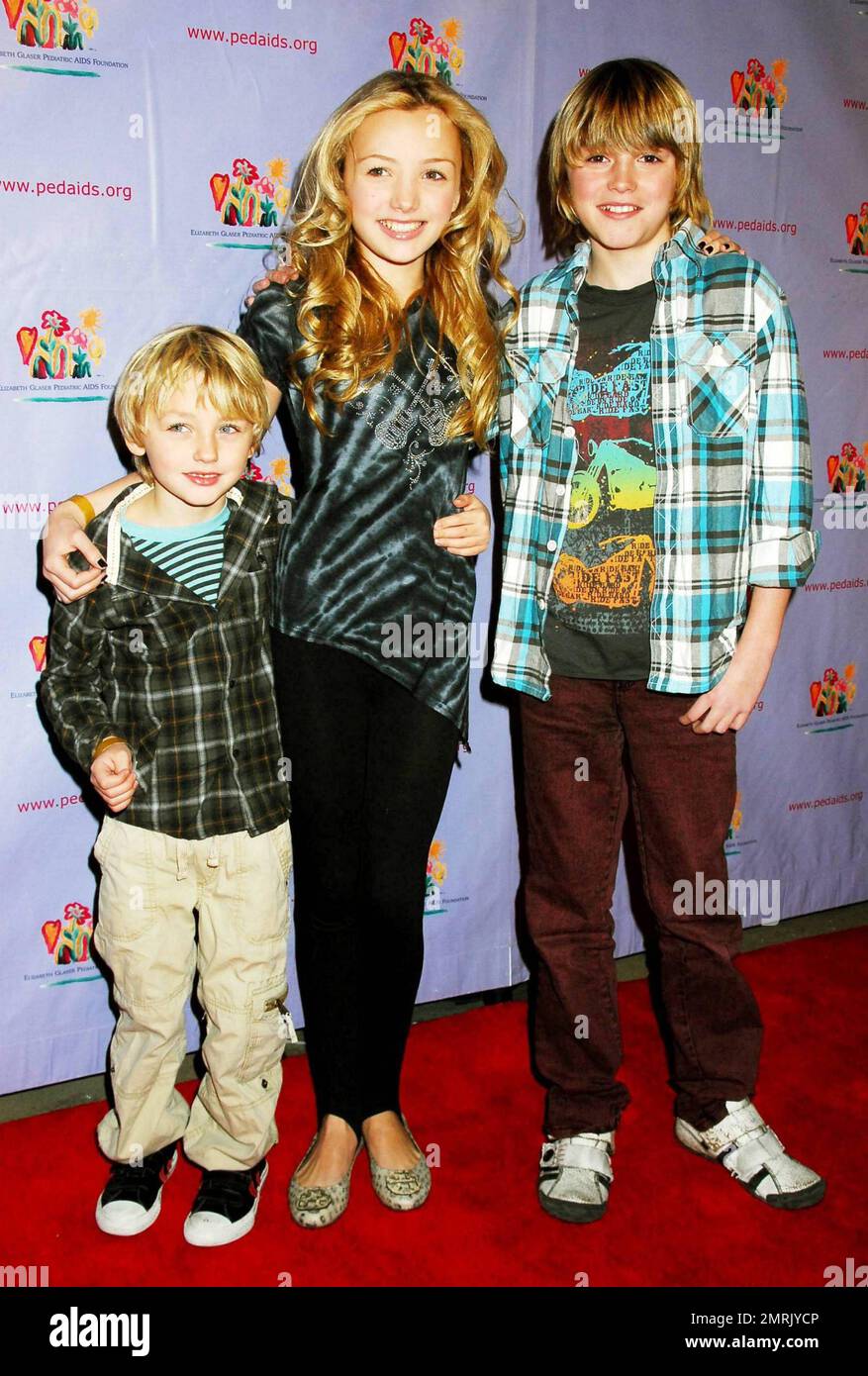 Phoenix List, Peyton List and Spencer List pose for photographers at ...