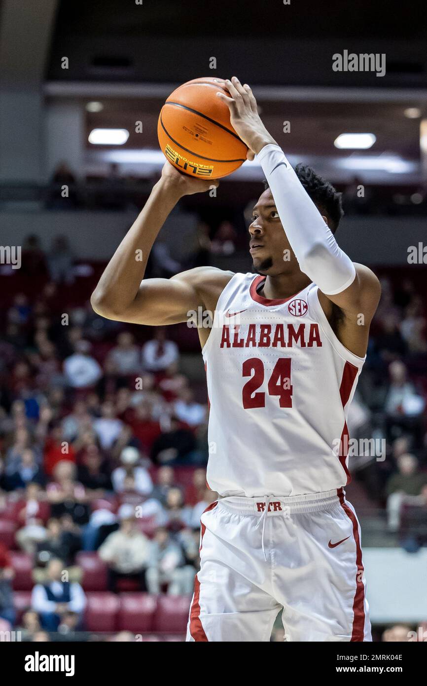Alabama forward Brandon Miller shoots a three-point shot against ...