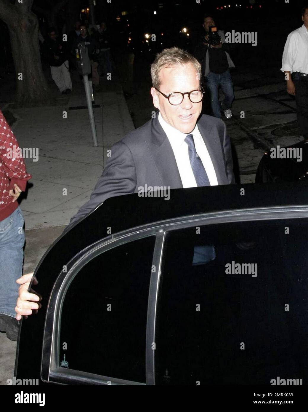 Kiefer Sutherland leaves Dominics with gal pal in the back of a waiting ...