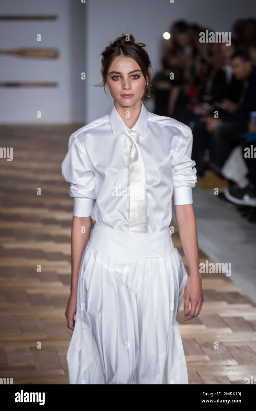 A model wears a creation by designer DAKS during their Spring/Summer ...